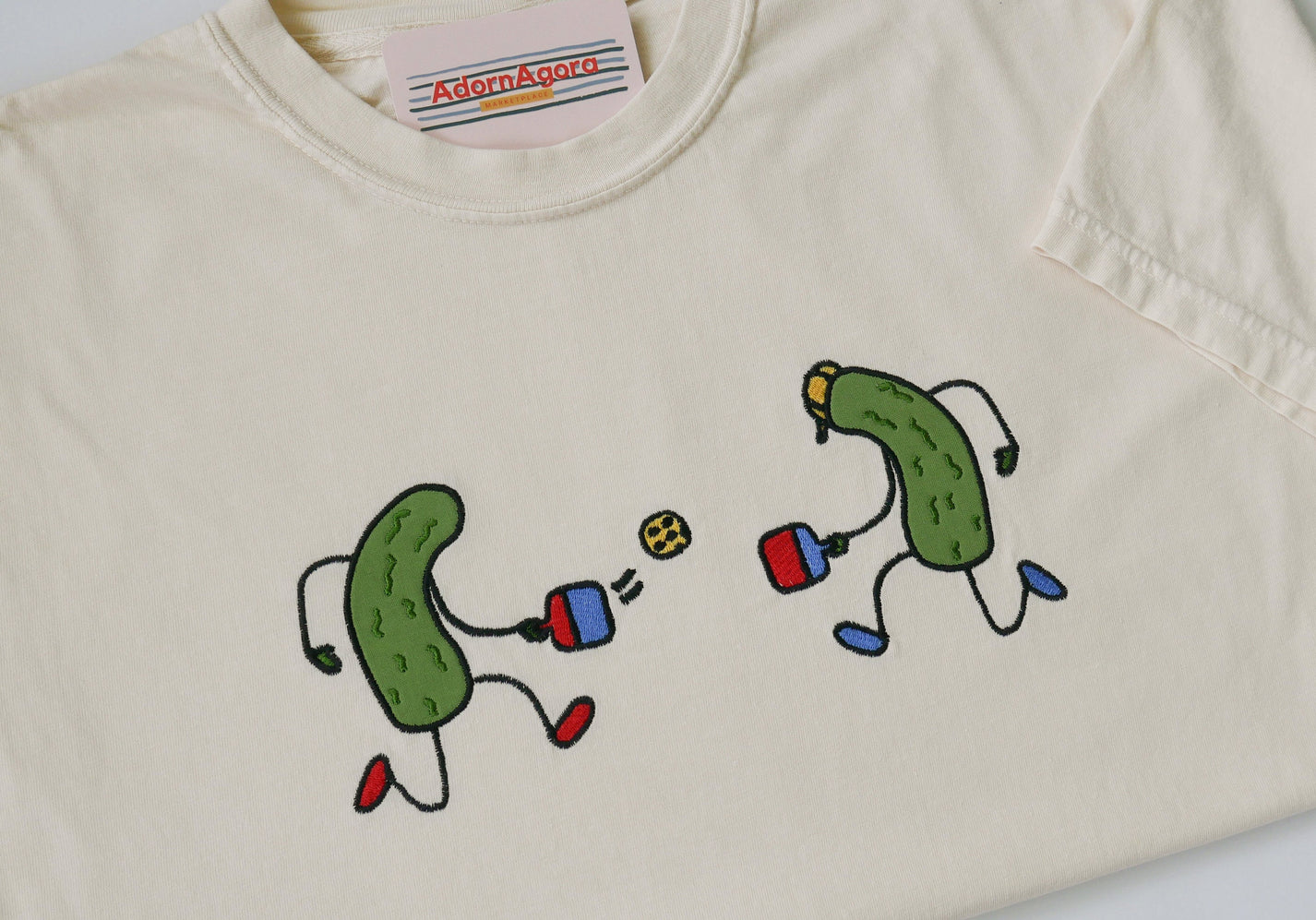 Pickles Playing Pickleball Appliqué T-Shirt – AdornAgora